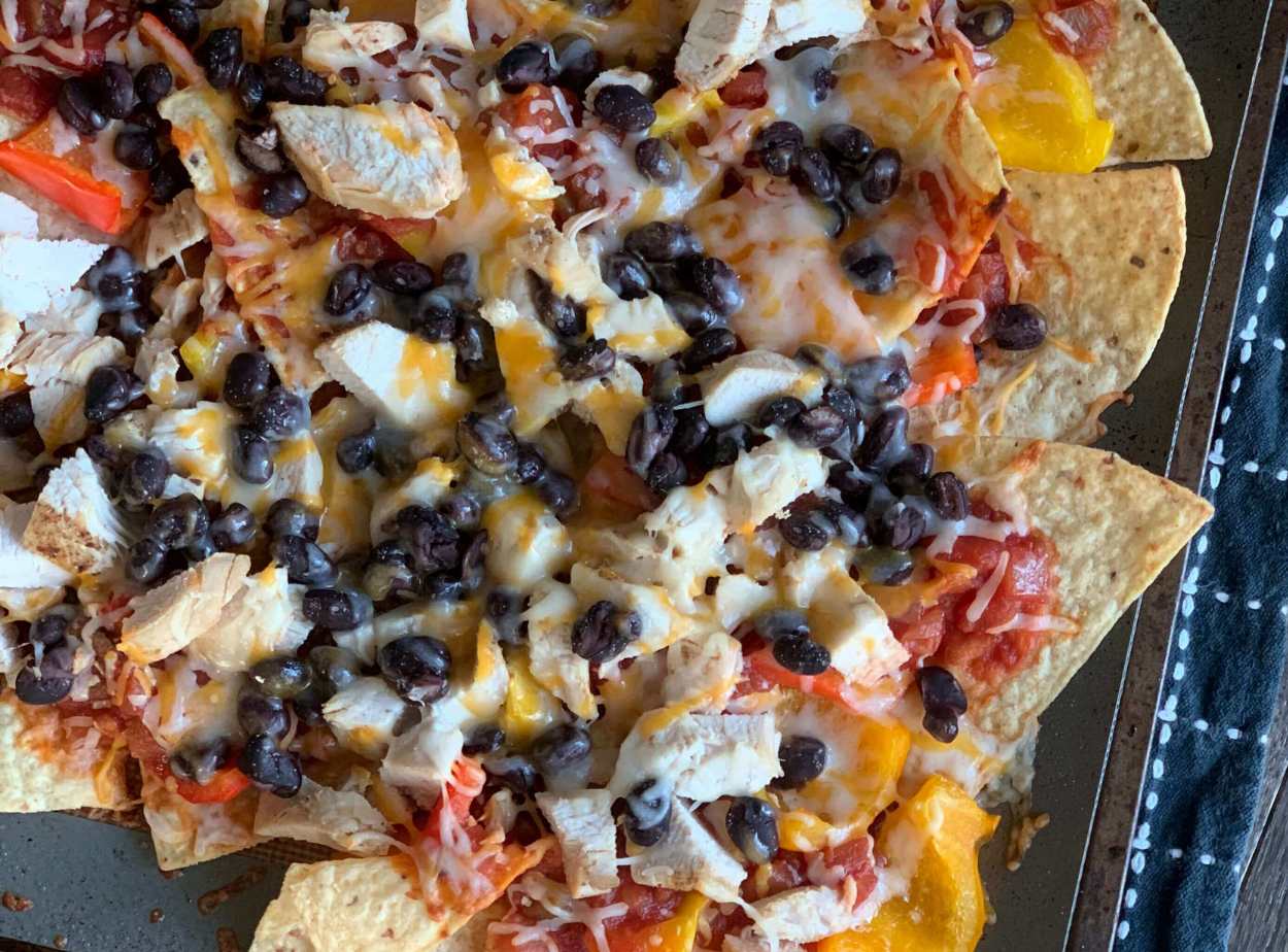 Loaded Bell Pepper Nachos (with half chips!) - The Balanced Nutritionist