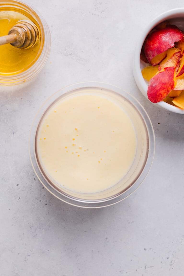 Easy Ninja Creami Peach Ice Cream | The Balanced Nutritionist