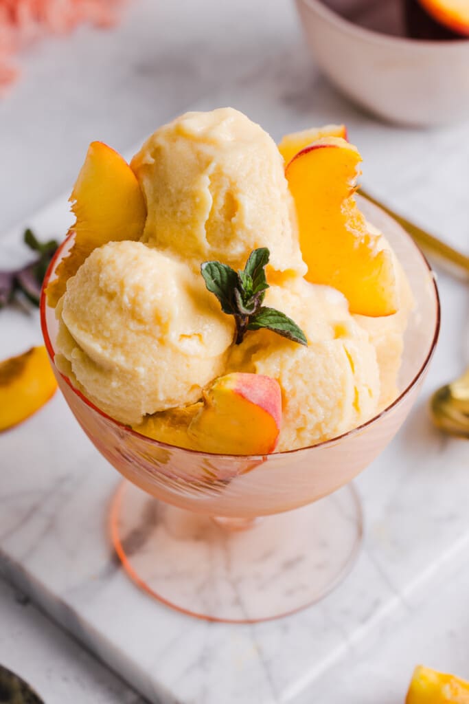 Easy Ninja Creami Peach Ice Cream | The Balanced Nutritionist